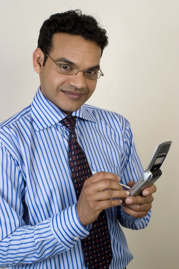 Young Indian Executive Taking a Call Stock Image - Image of handsome ...