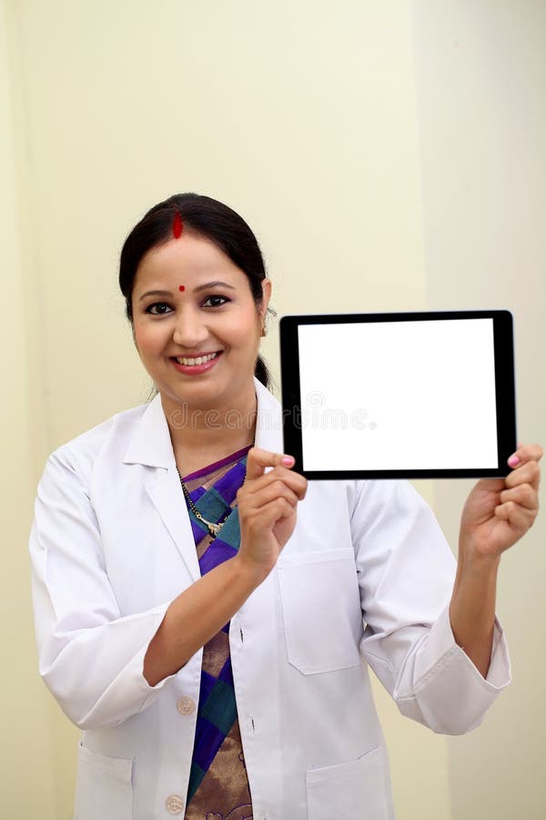 Young Indian Female Doctor Holding Tablet Computer Stock Photo - Image ...