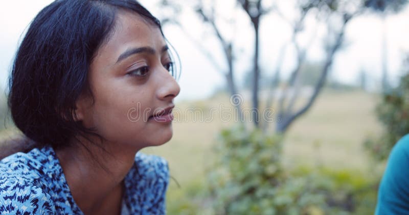 Young Indian Female Talking To Someone and Smiling Stock Photo - Image ...