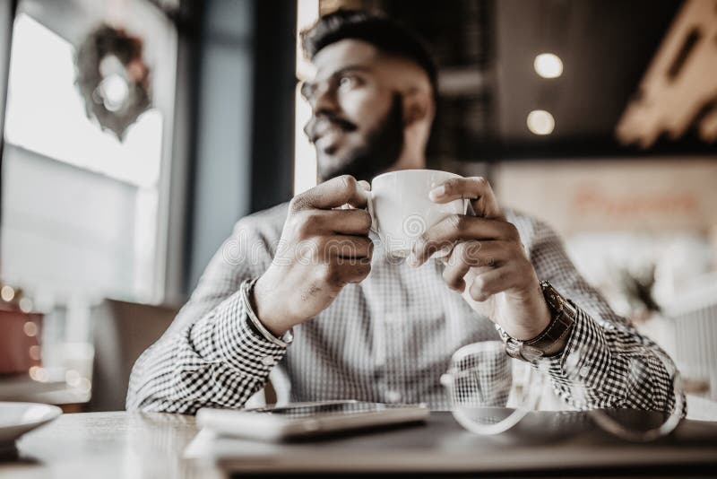 Young Indian Man Drinking Coffee in Cafe Stock Photo - Image of ...