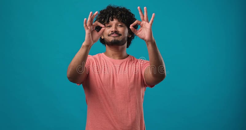 Young Indian Man Satisfied Happy Guy Showing Binoculars Gesture