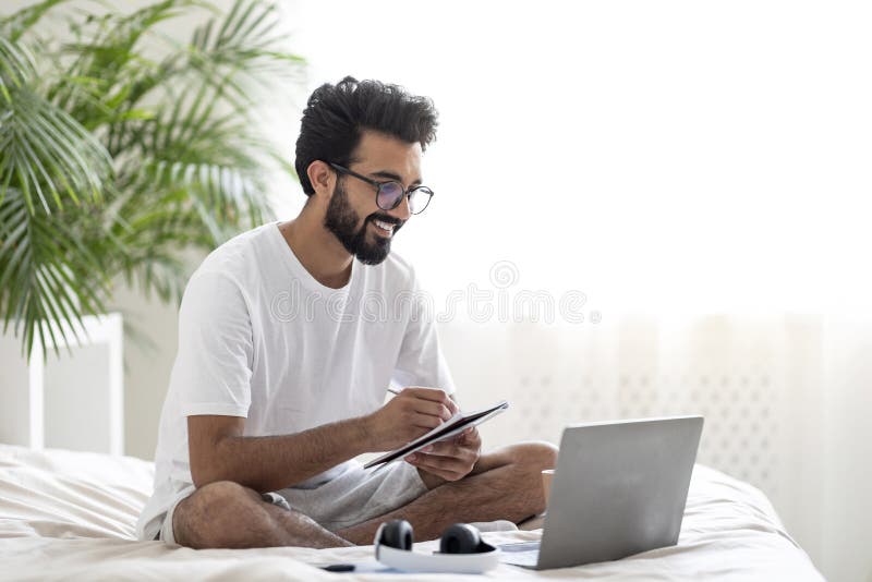Healthy Sleeping. Portrait of Young Indian Man Lying in Bed in Night ...