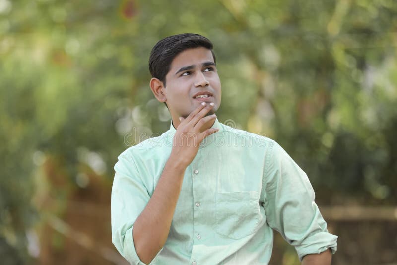 Young Indian Man Thinking Some Idea Stock Photo - Image of idea, male ...