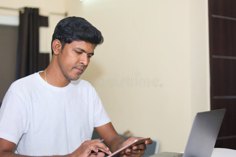 Man Working Diligently Laptop Home Office Desk Stock Photos - Free ...