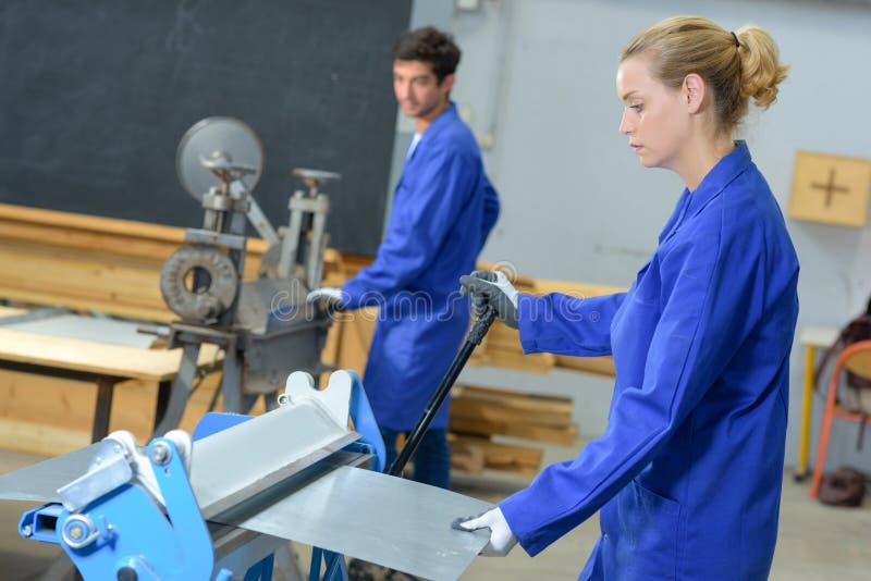 Young Industrial Operatives at Work Stock Photo - Image of manufacture ...