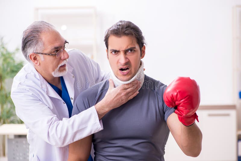 Young Injured Boxer Visiting Old Doctor Traumatologist Stock Image ...