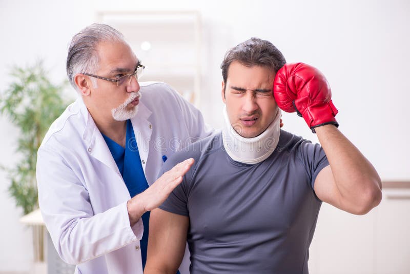 Young Injured Boxer Visiting Old Doctor Traumatologist Stock Image ...