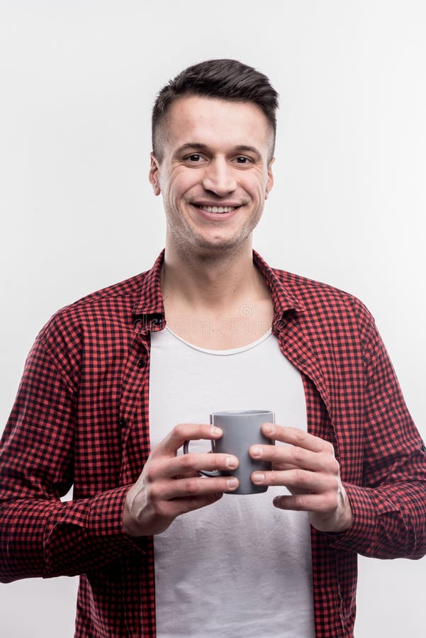 Young Intern Holding Blue Cup with Coffee while Having Lunch Break ...