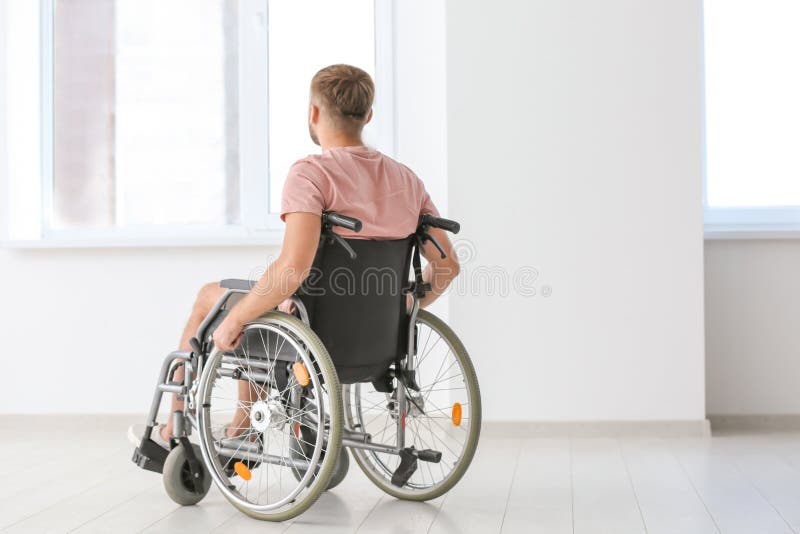 Young Invalid Man in Empty Room Stock Photo - Image of person ...
