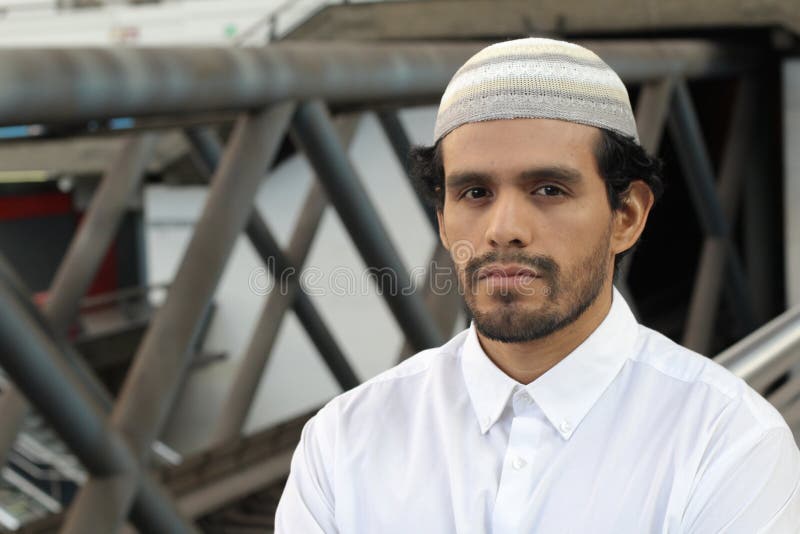 Young Islamic Man Staring at Camera Stock Image - Image of islamic ...