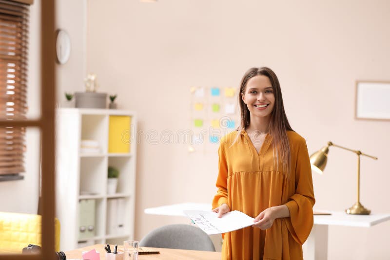 Young Journalist with Papers at Workplace Stock Photo - Image of happy ...