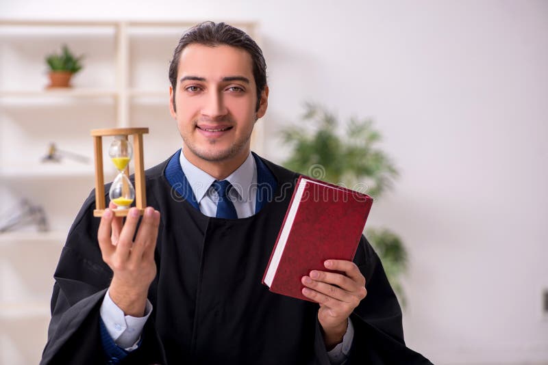 Young Male Judge in Time Management Concept Stock Image - Image of ...
