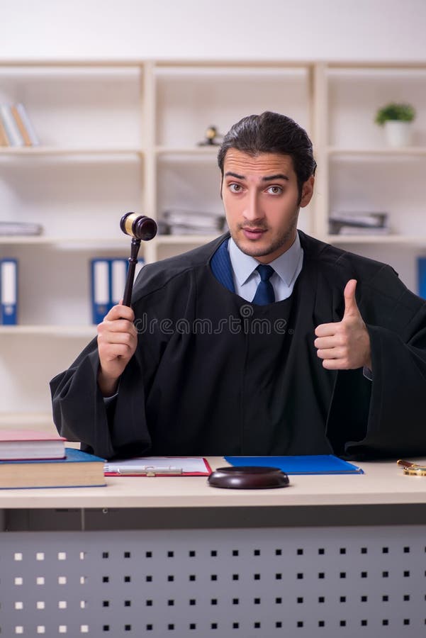 Young Male Judge Working in Courthouse Stock Image - Image of case ...