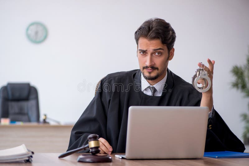 Young Male Judge Working in the Courthouse Stock Photo - Image of gown ...