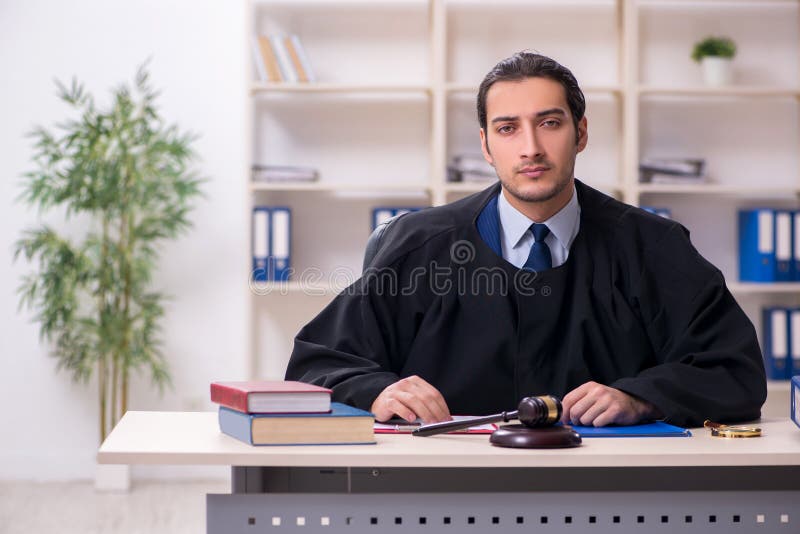 Young Male Judge Working in Courthouse Stock Image - Image of juridical ...