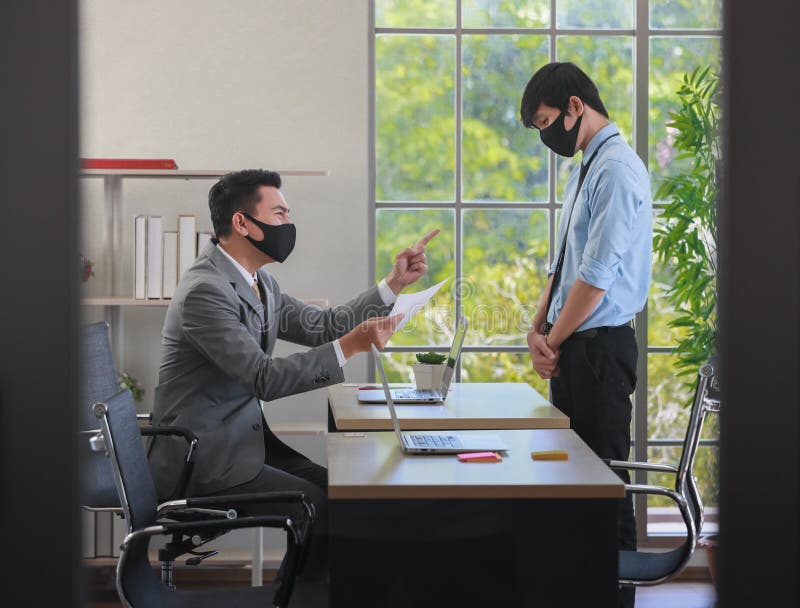 A Young Junior Employee Feels Guilt and Sad when the Boss Blame and ...