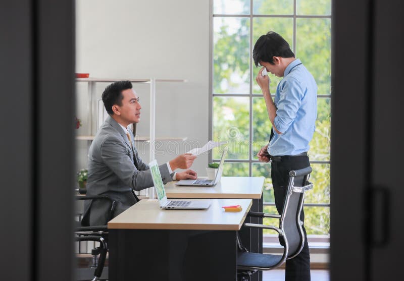 A Young Junior Employee Feels Sad and Crying when the Boss Blame and ...