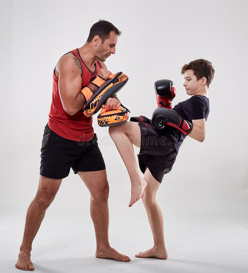 Kickboxer Kid and His Coach Stock Photo - Image of mitts, coach: 133155976