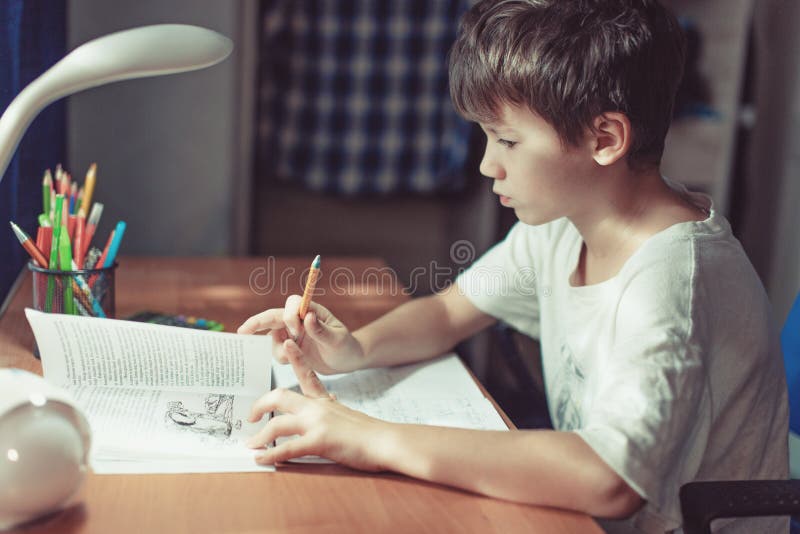 Young Kid Doing Homework or Learning at Home Stock Image - Image of ...