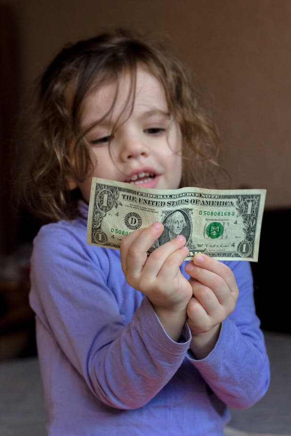 Young Kid Girl Holding Money in Hands Stock Image - Image of brunette ...