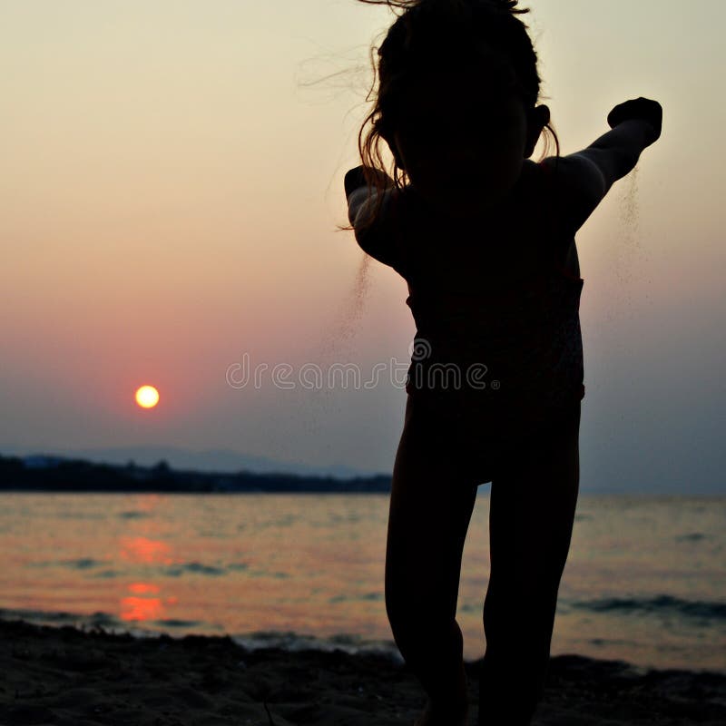 Young kid girl sand sunset stock image. Image of adorable - 3366275