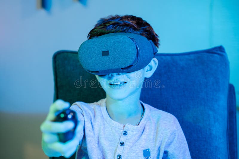 Young Kid Playing Game by Wearing Vr or Virtual Reality Headset and ...
