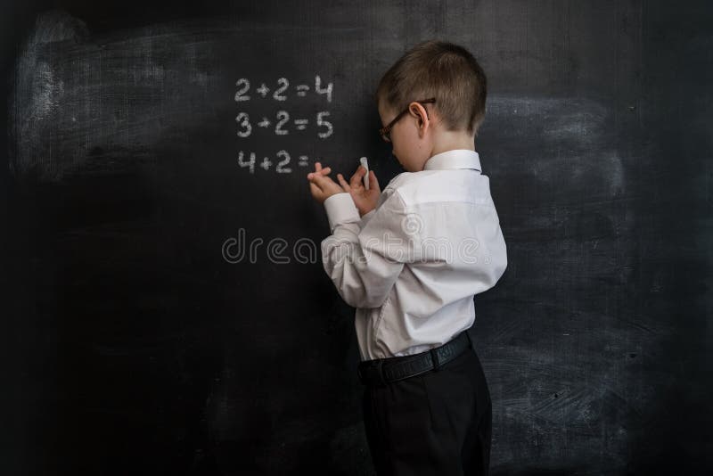 Young Kid`s Solving Elementary Maths Expression. Back To School Concept ...