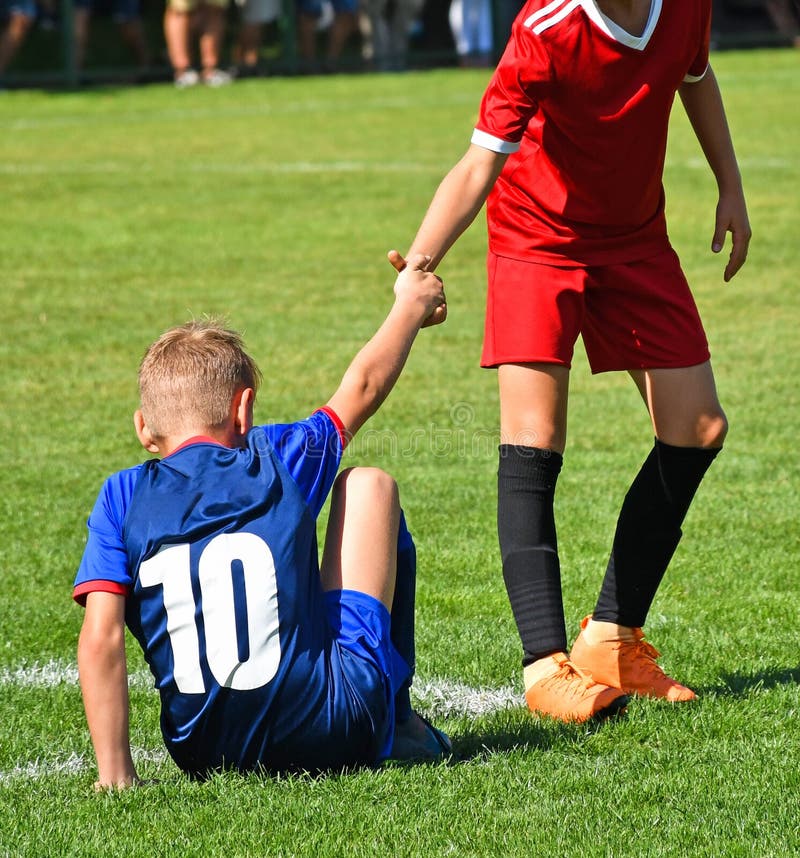 Soccer Player Helping Another Soccer Player Stock Photos - Free ...