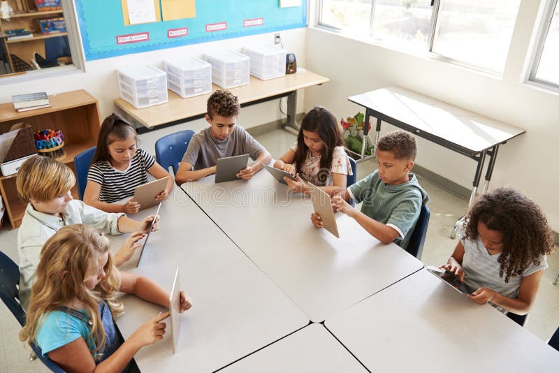 Young Kids Using Tablets in School Lesson, Elevated View Stock Image ...