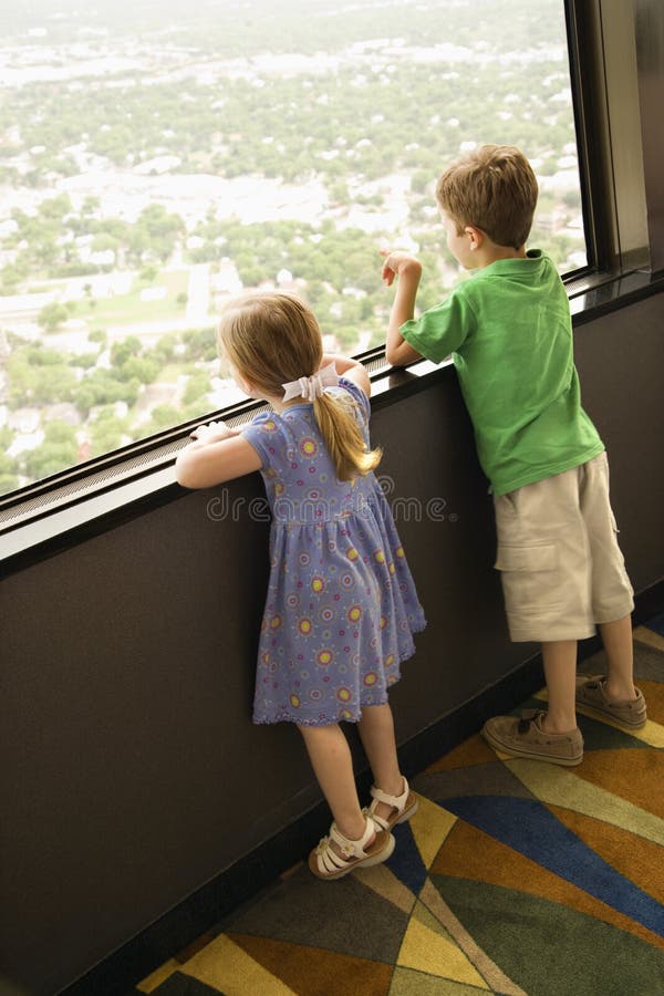 Girl at window. stock photo. Image of cute, color, toddler - 2284512