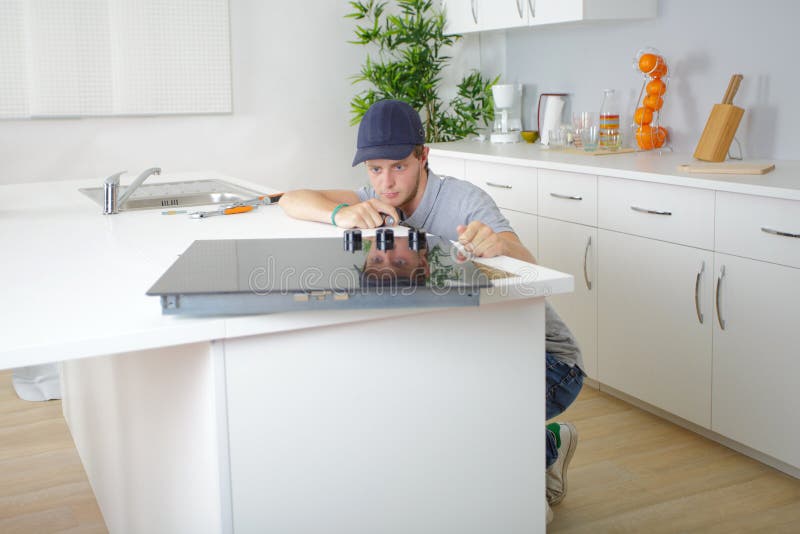 Young Kitchen Installer at Carpenter Work Stock Photo - Image of ...