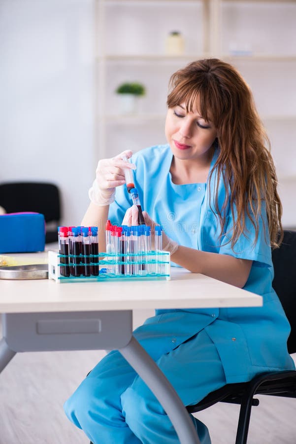 Young Lab Assistant Testing Blood Samples in Hospital Stock Photo ...
