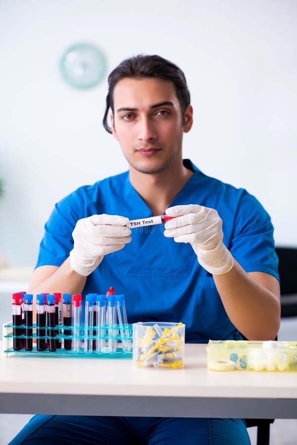 Young Lab Assistant Testing Blood Samples in Hospital Stock Image ...