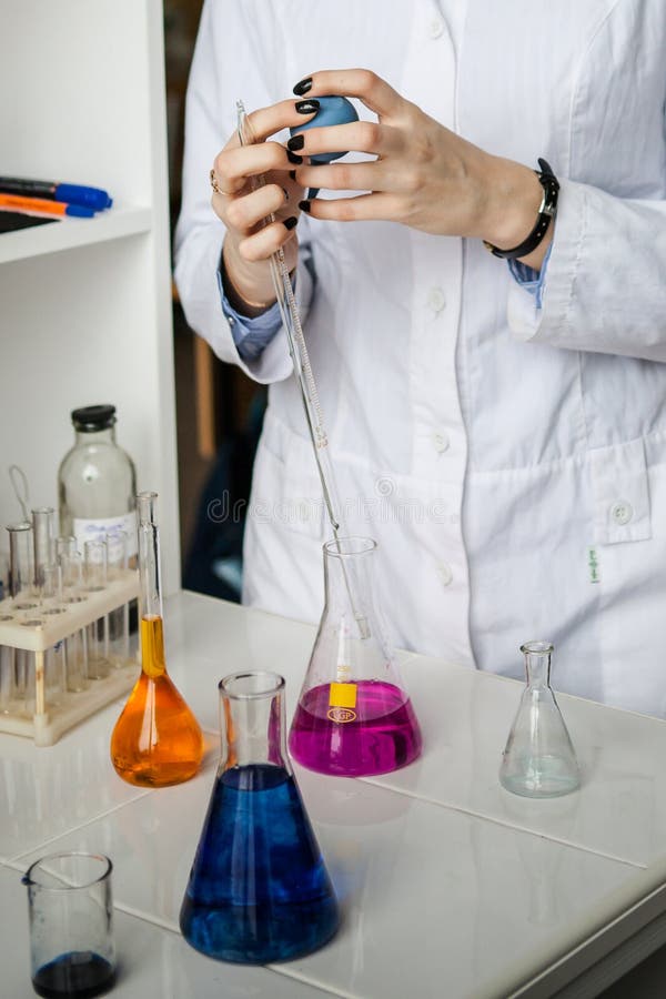 Young Laboratory Assistant Making Test or Research in Lab. Technician ...