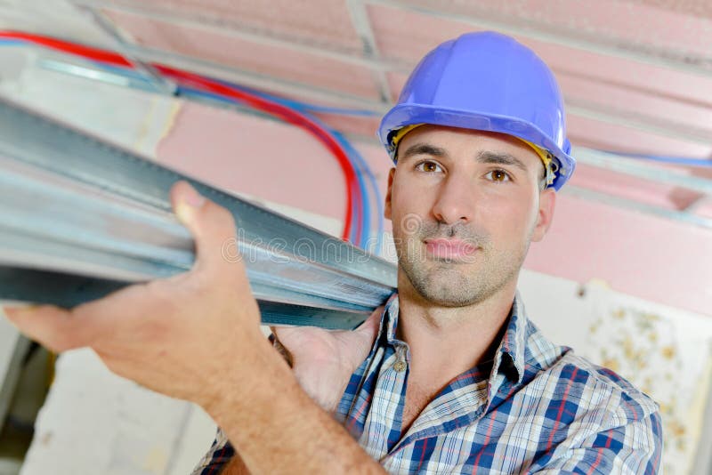 Young labourer at work stock image. Image of caucasian - 197178977