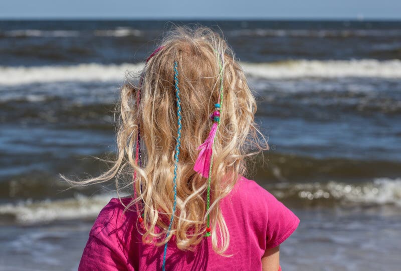 Young lady on a beach stock photo. Image of happiness - 39732676