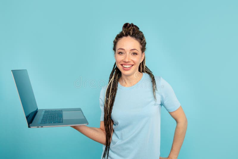 Young Lady in the Blue T-shirt Using Laptop Computer. Stock Photo ...