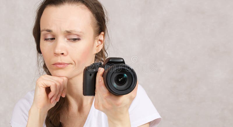 Young lady with a camera stock image. Image of female - 83069979