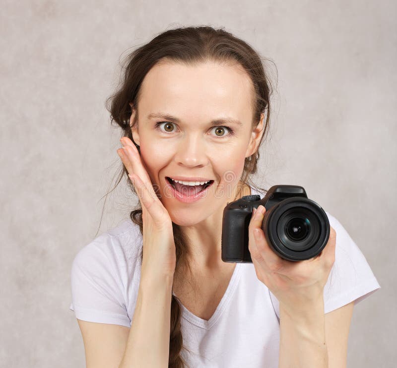 Young lady with a camera stock image. Image of space - 83070053