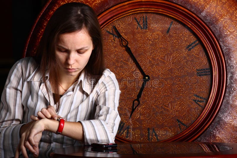 Young lady and clock stock photo. Image of professional - 11642950