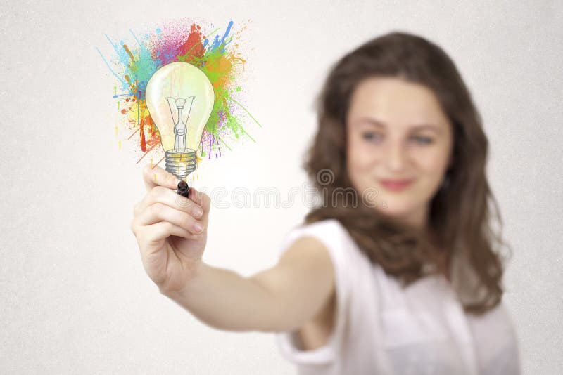 Pencil Close-up with Colored Paint Splashes and Lightbulb Stock Photo ...