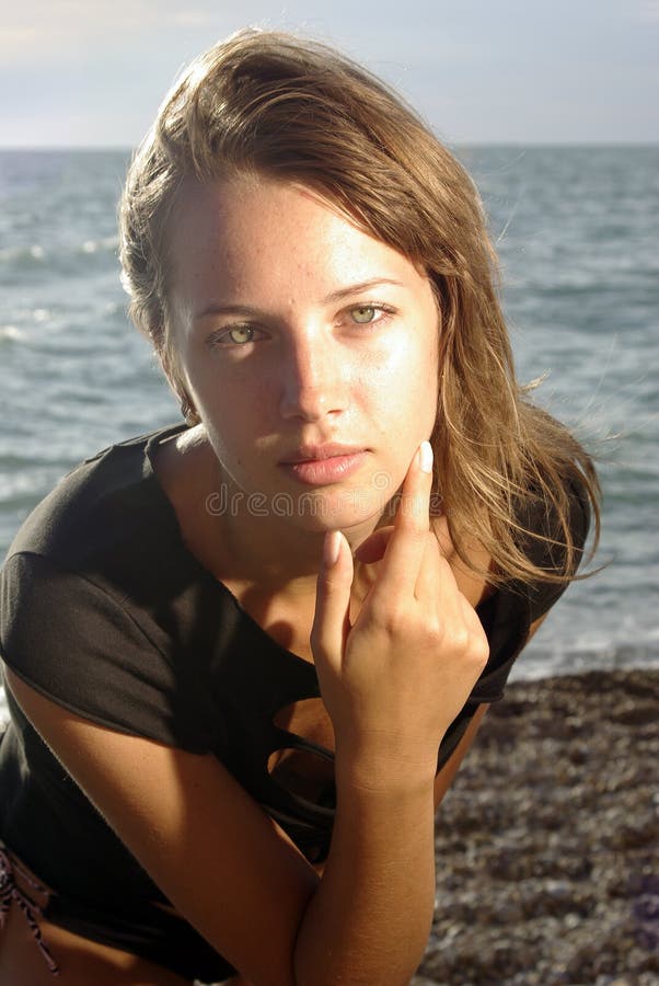 Young lady face on a beach stock image. Image of attractive - 16048725