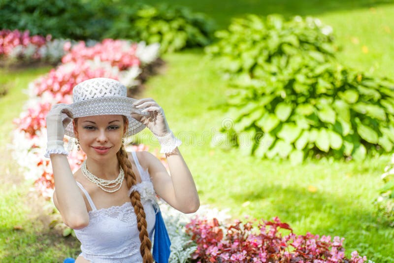 Young lady in garden stock photo. Image of cute, fashion - 79971756