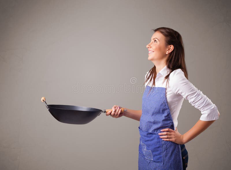 Young Lady Holding a Frying Pan Stock Image - Image of frying, holding ...