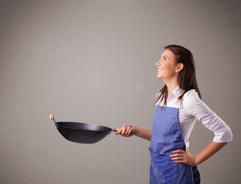 Young Lady Holding a Frying Pan Stock Image - Image of cook, home: 41866743