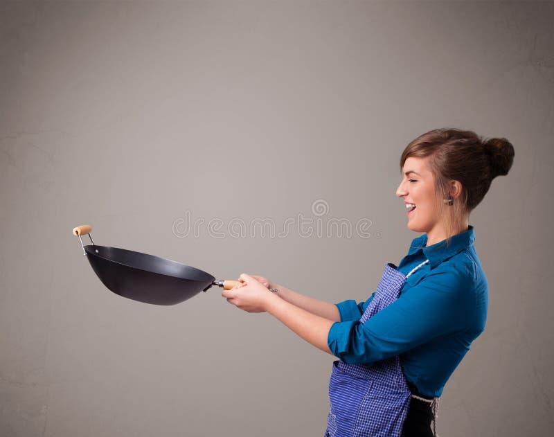 Young Lady Holding a Frying Pan Stock Photo - Image of home, meal: 51013952