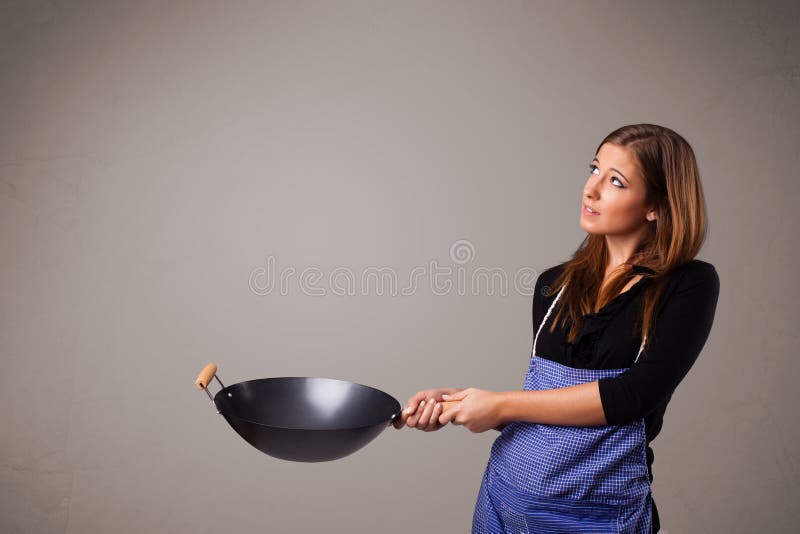Young Lady Holding a Frying Pan Stock Image - Image of handle, chef ...