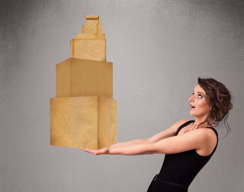 Young Lady Holding a Set of Brown Cardboard Boxes Stock Photo - Image ...