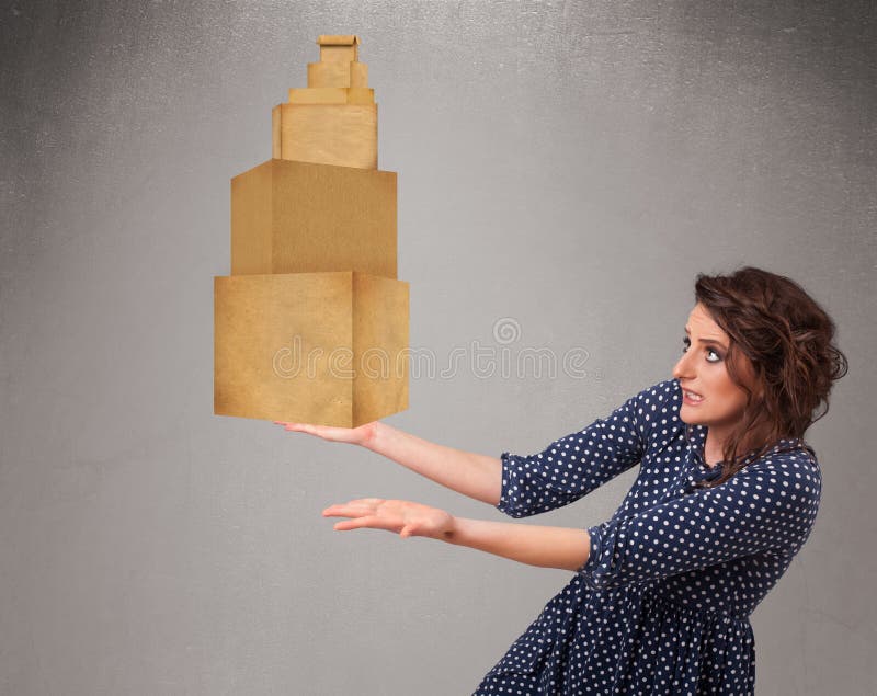 Young Lady Holding a Set of Brown Cardboard Boxes Stock Photo - Image ...