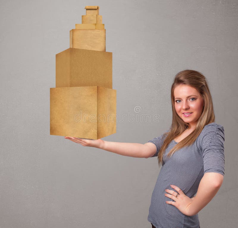 Young Lady Holding a Set of Brown Cardboard Boxes Stock Photo - Image ...